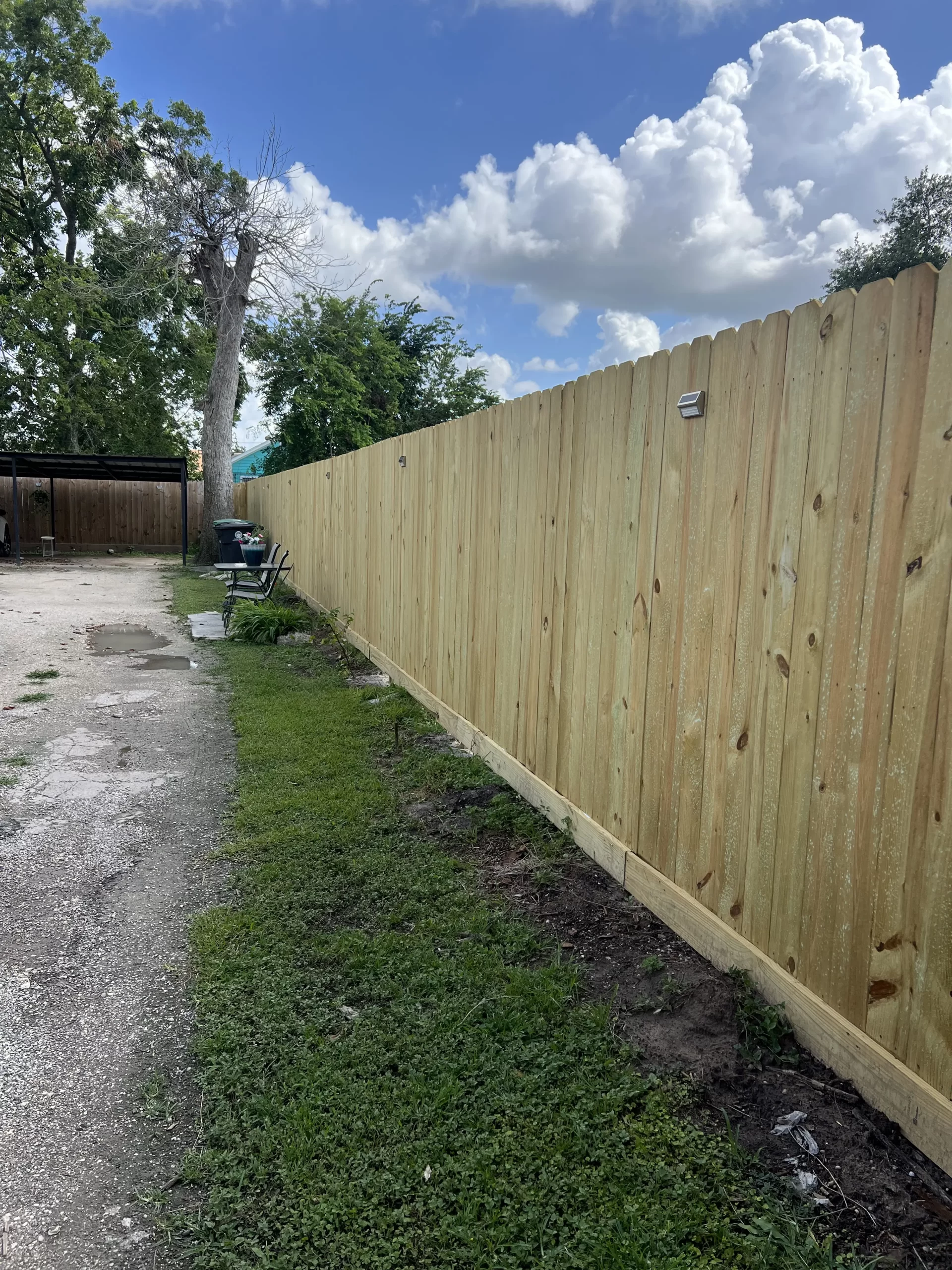Installing a Pine Guard Privacy Fence in Spring, TX - Mustang Fencing ...