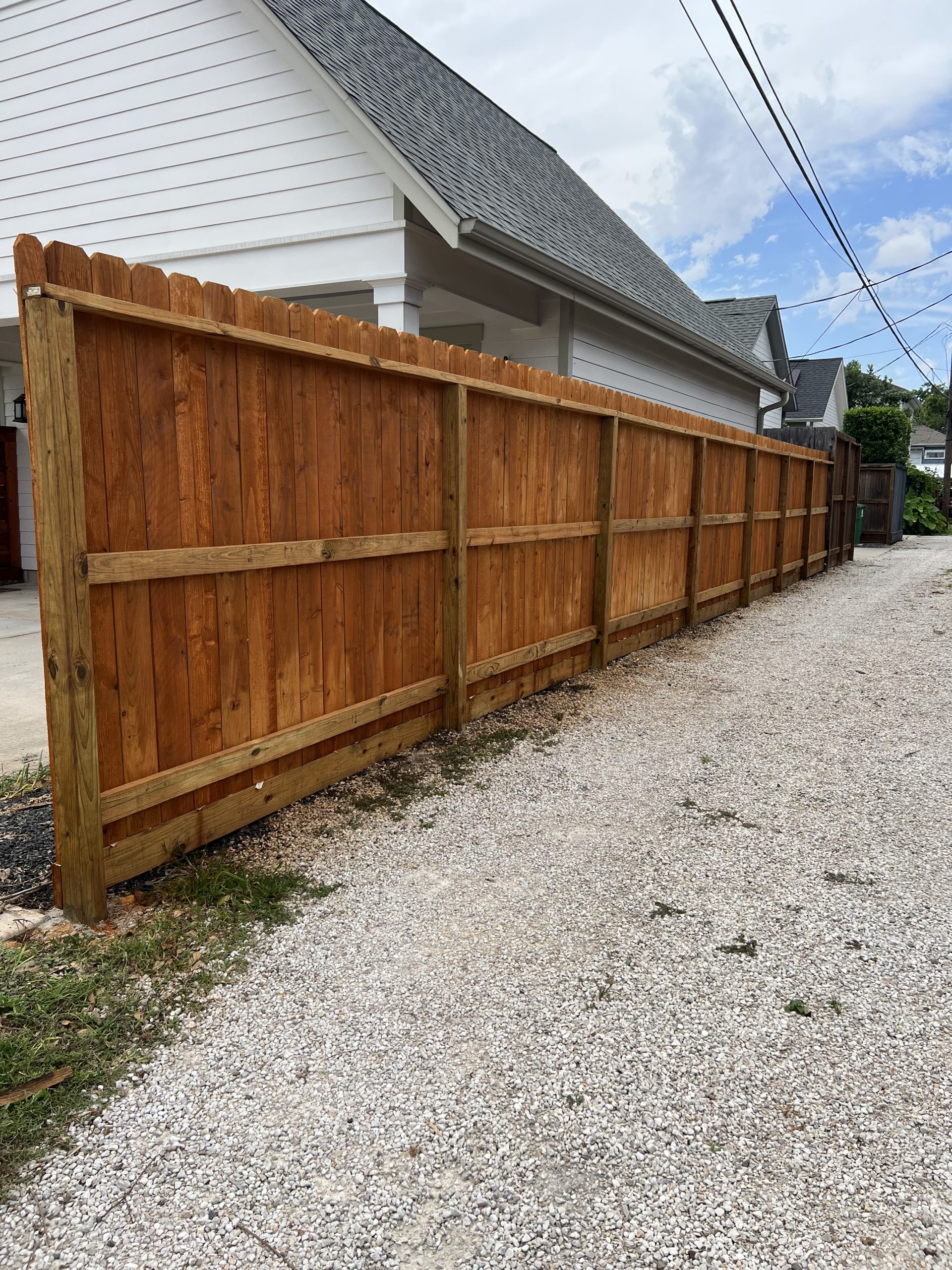 Transforming Logan's Property with a Beautiful Wooden Fence - Mustang ...