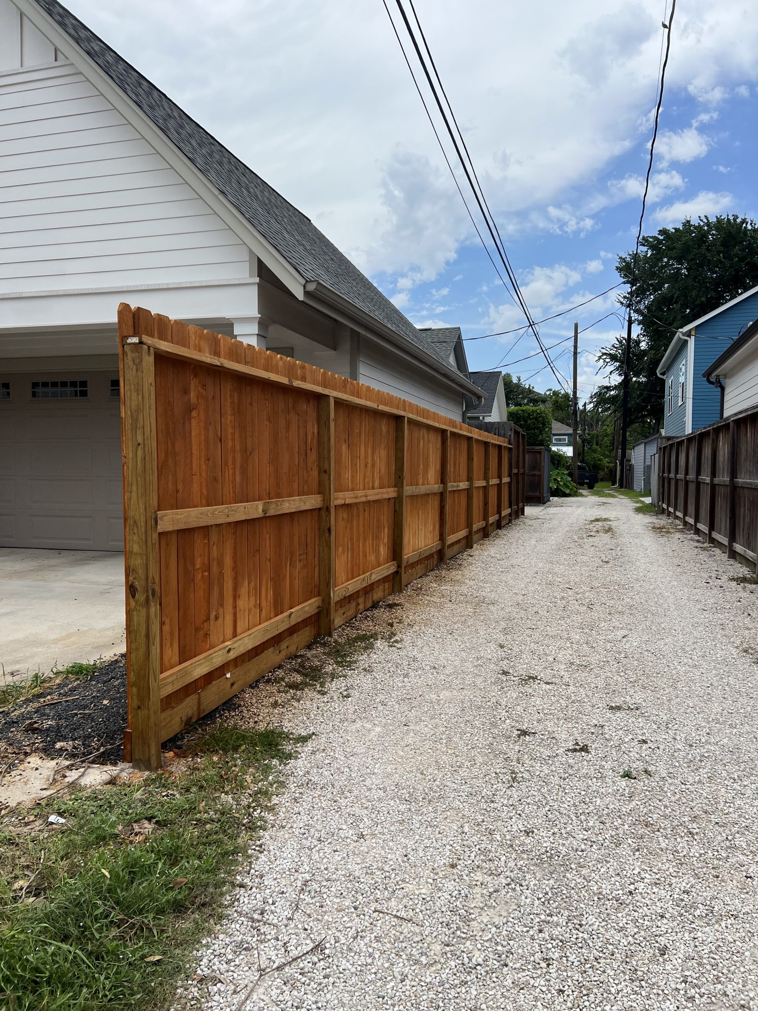 Transforming Logan's Property with a Beautiful Wooden Fence - Mustang ...