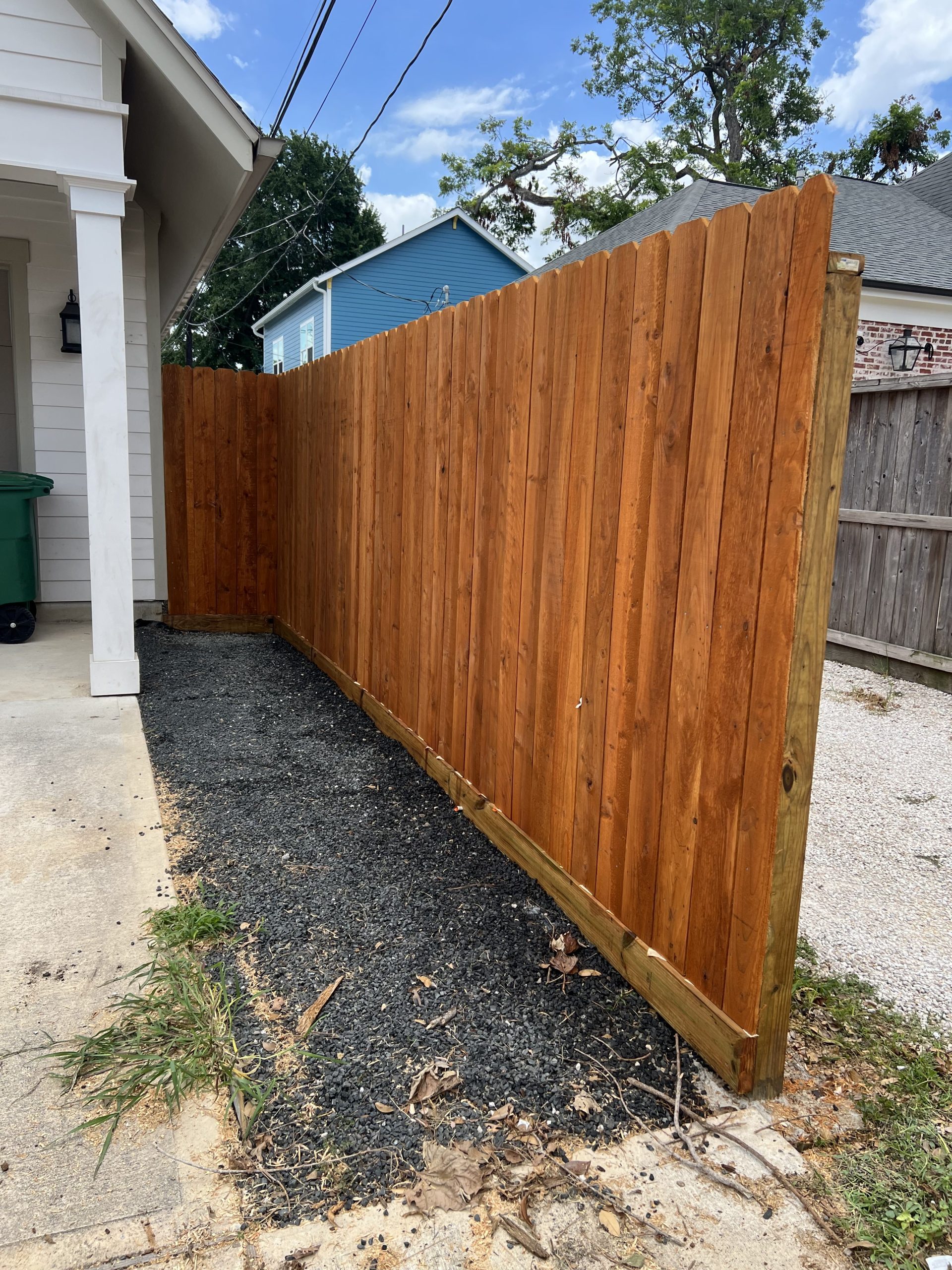 Transforming Logan's Property with a Beautiful Wooden Fence - Mustang ...