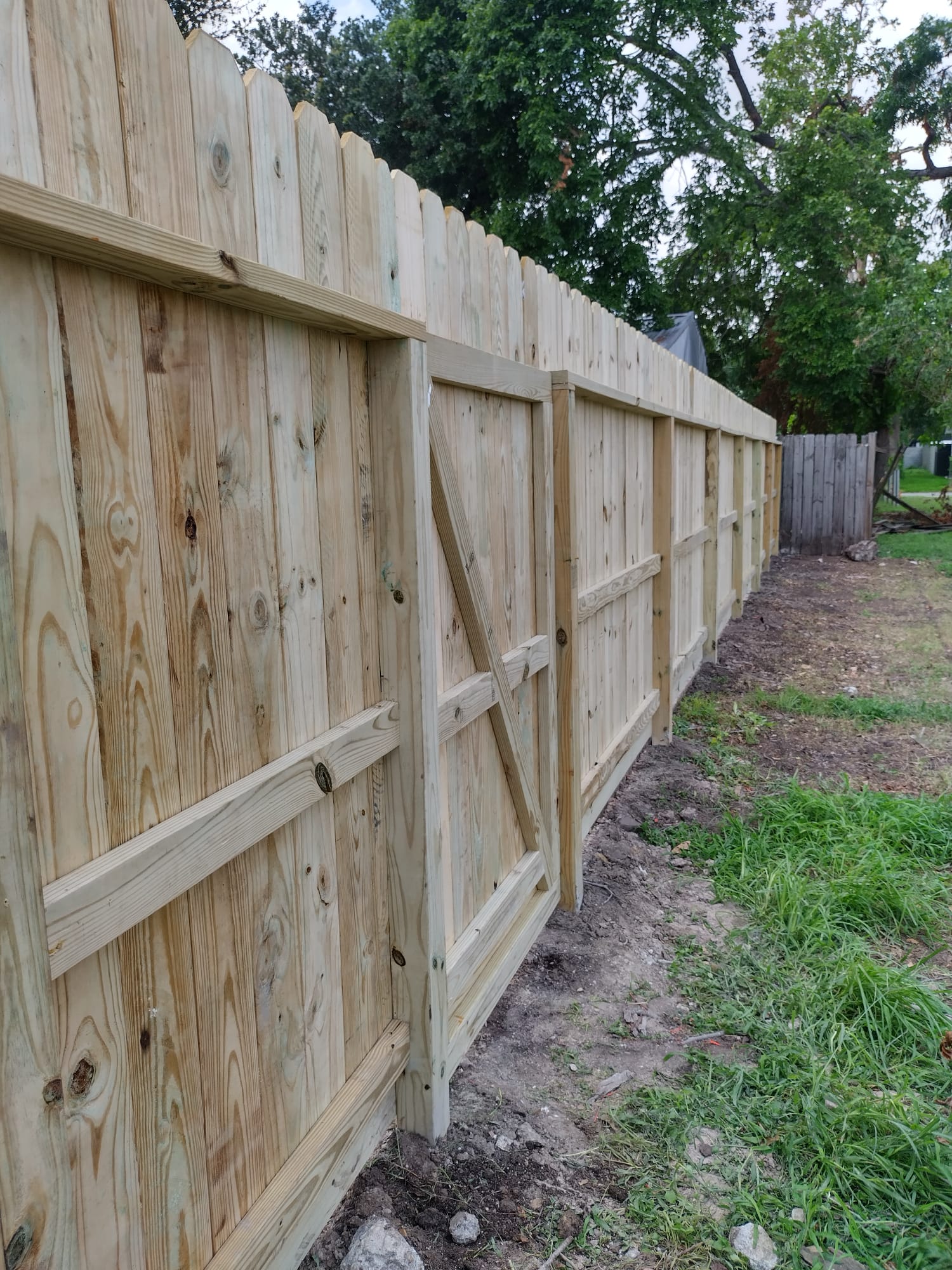 Building a Wooden Fence for His Houston Home- Mustang Fencing and Gates